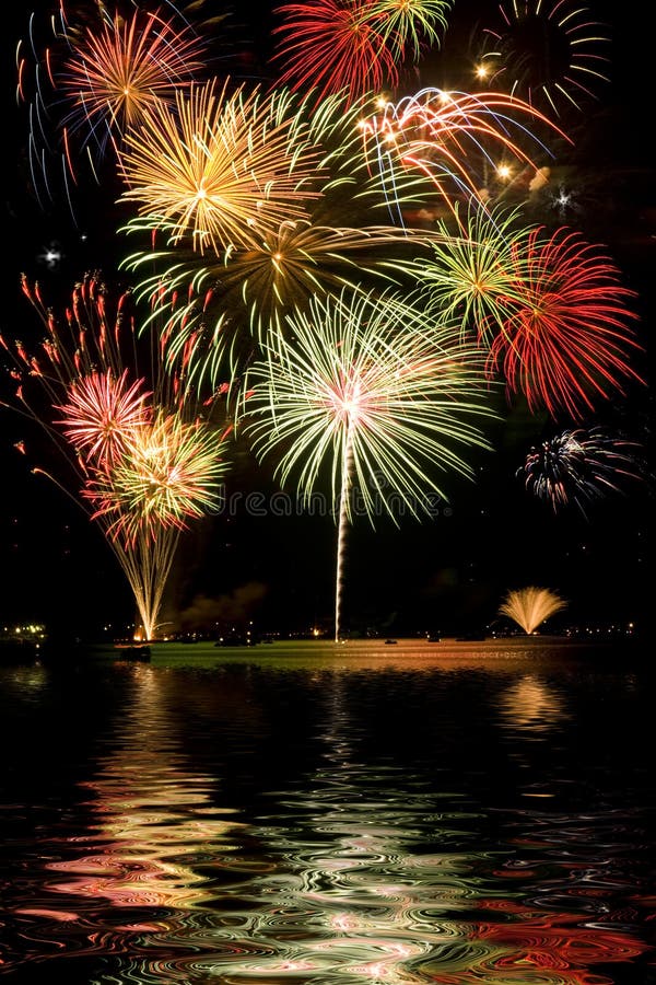 Fireworks Over City by the Water Stock Photo - Image of magic, dark ...