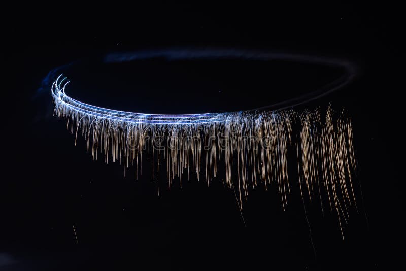 Fireworks and light trails stock photo. Image of flare - 168453192