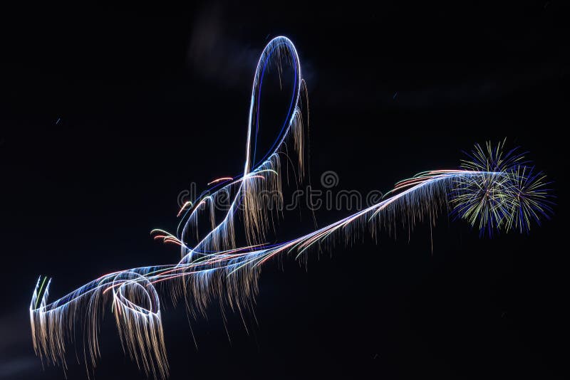 Fireworks and light trails stock photo. Image of pattern - 168453202
