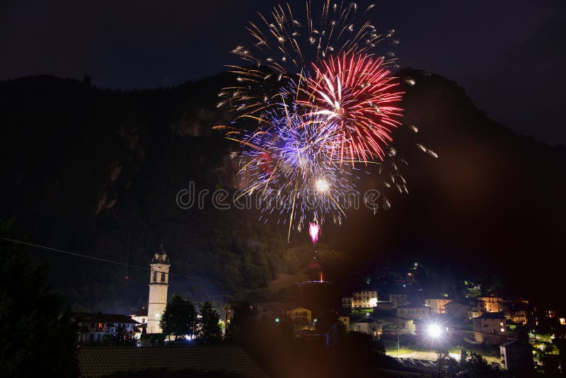 Fireworks in the mountains stock photo. Image of firework - 253477876