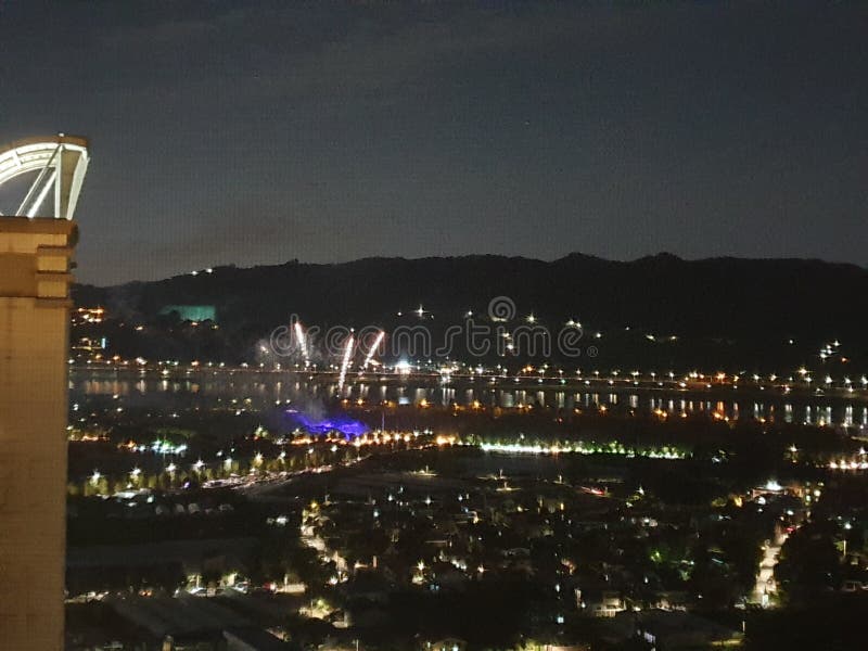 Fireworks near riverside stock photo. Image of dawn - 212197104