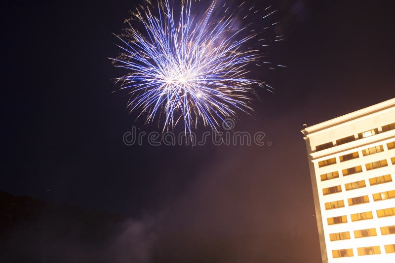 View of Fireworks Next To a Tall Building Stock Photo - Image of tall ...