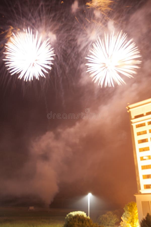 View of Fireworks Next To a Tall Building Stock Image - Image of tall ...