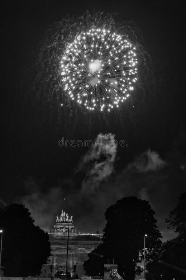 Black and White Fireworks Exploding High in the Night Sky, Creating a ...