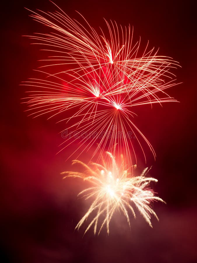 Fireworks in the night sky stock image. Image of glowing - 76213535