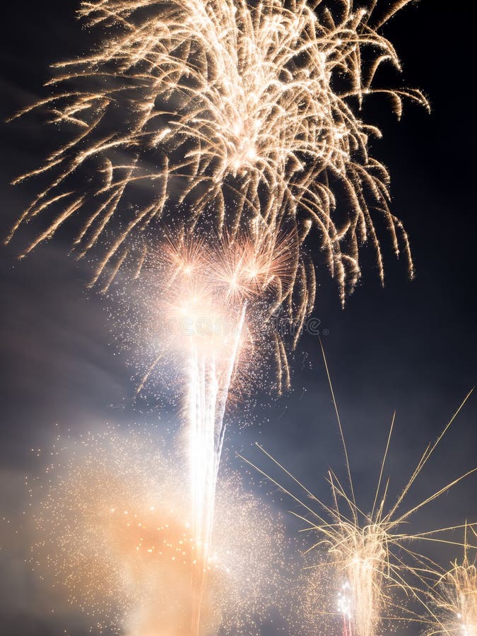 Fireworks in the night sky stock photo. Image of festive - 44010388