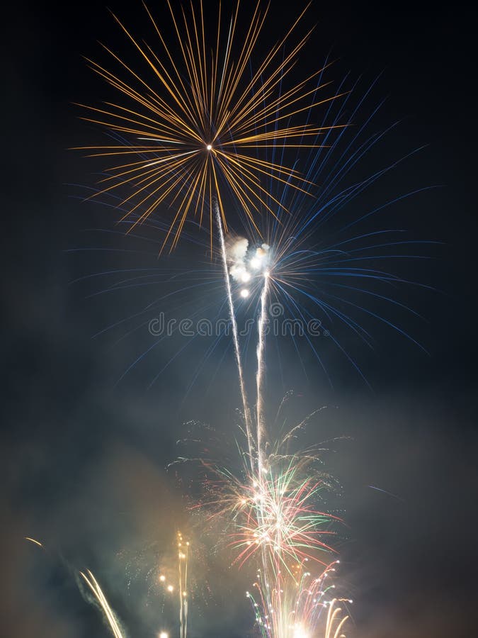 Fireworks in the night sky stock photo. Image of fireworks - 76214878