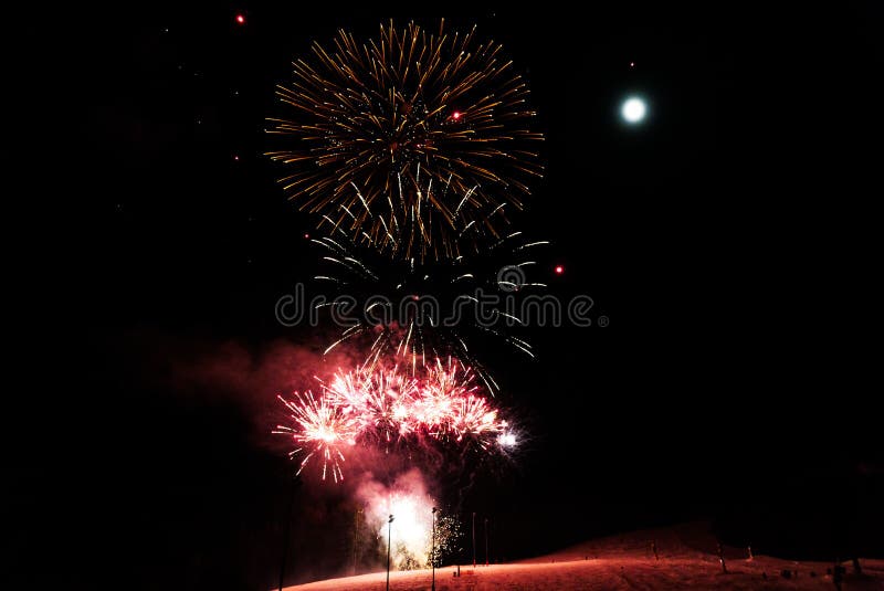 Fireworks in a Night Sky with Moon Stock Image - Image of black ...