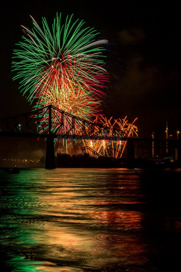 Fireworks over bridge stock image. Image of explosion - 59985375