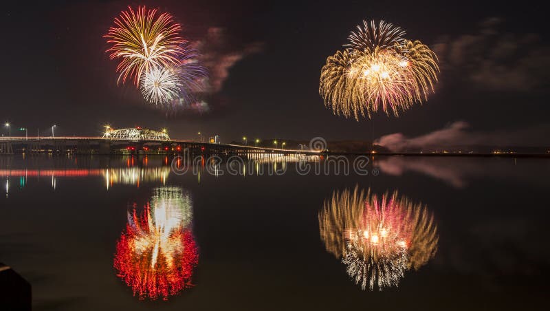 Fireworks over bridge stock image. Image of night, reflection - 48496403