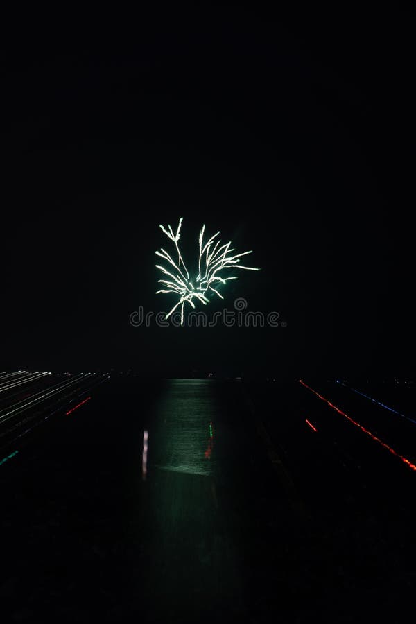 Fireworks Over a Lake stock photo. Image of light, sand - 224911412