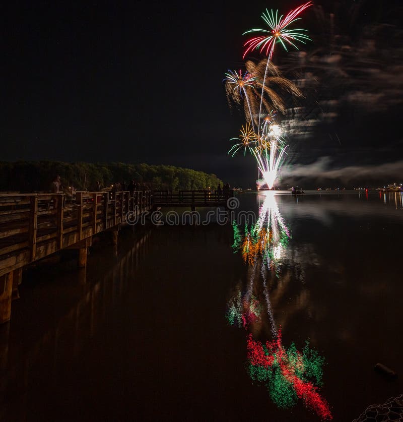Fireworks Over a Lake and Dock Stock Image - Image of recreation ...