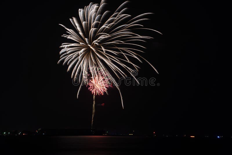 Fireworks Over a Lake stock image. Image of water, independence - 224911507