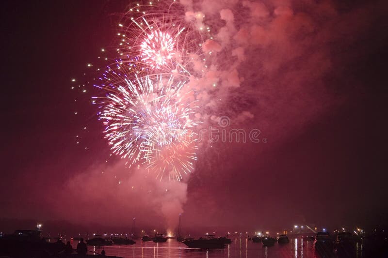 Fireworks at the lake stock image. Image of celebrate - 146150655