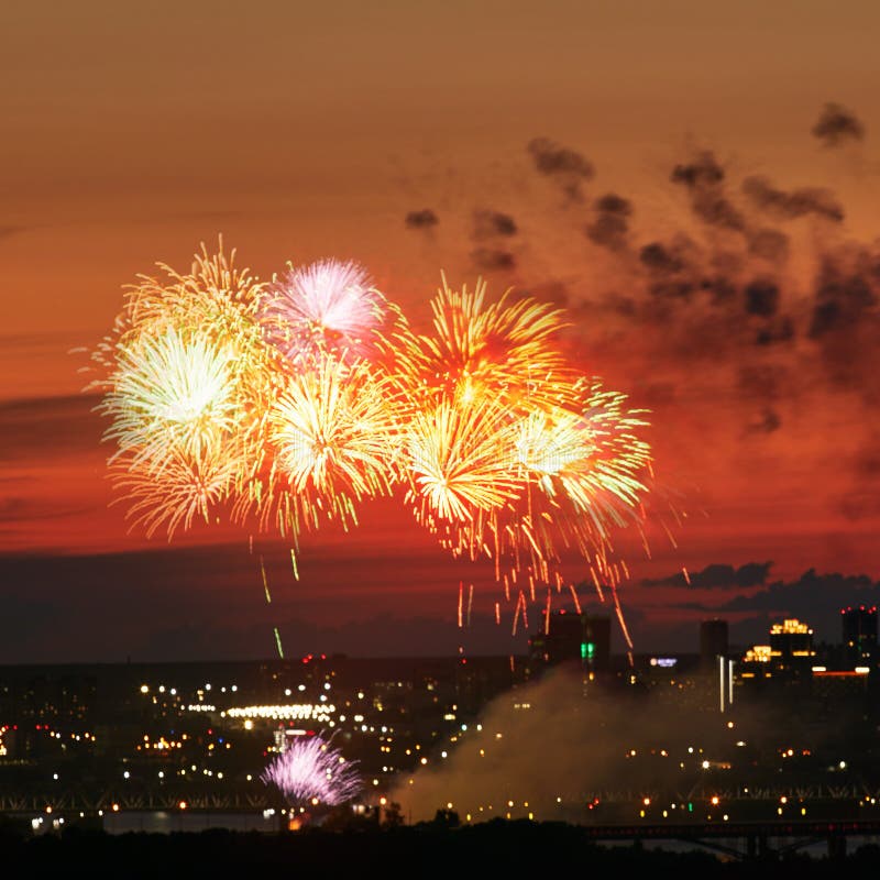Fireworks over night city stock photo. Image of firework - 203337784