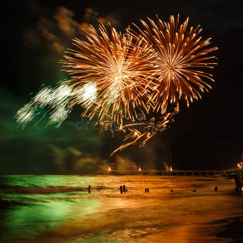 Fireworks over the sea stock image. Image of festive - 77607791