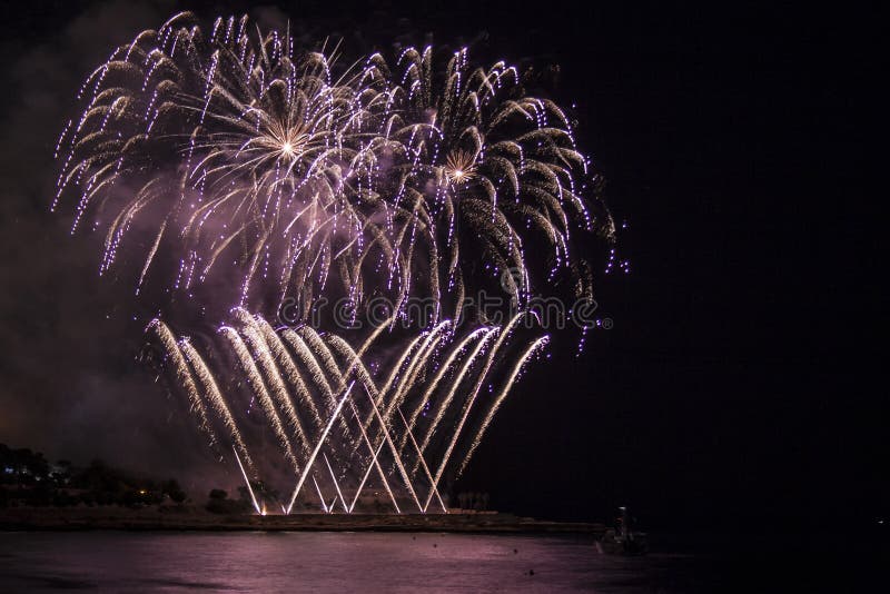 Fireworks over sea stock photo. Image of rockets, light - 167782150