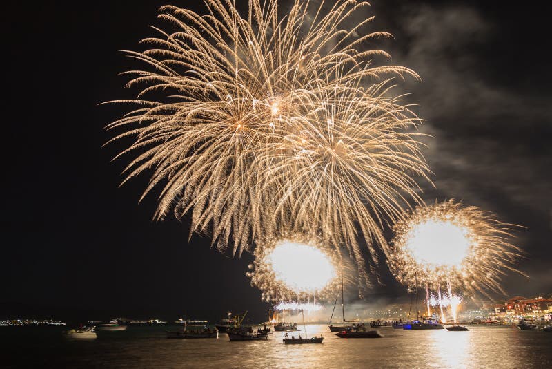 Fireworks Over the Sea Town Stock Image - Image of colors, happy: 75845049