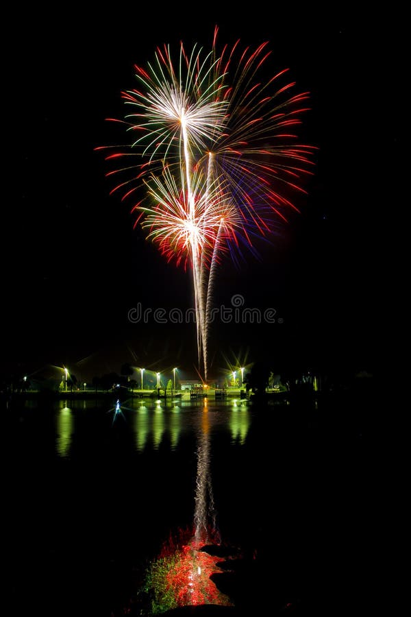 Fireworks over the water stock photo. Image of explosion - 25570144