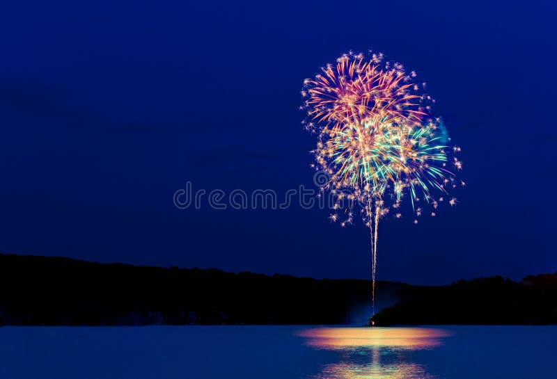 Fireworks Over Water with Copy Space Stock Photo - Image of ...