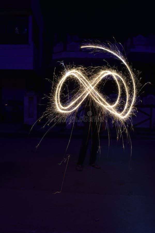 Fireworks Pattern with Phooljhadi Fire Stick on Diwali Festival Stock ...