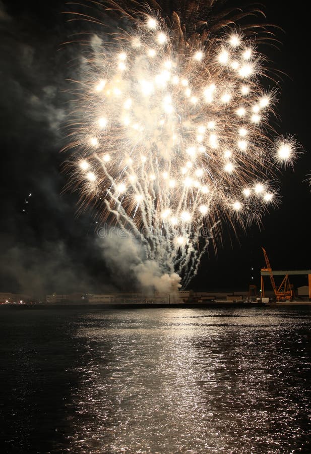 Fireworks Reflect on Sea Water Stock Image - Image of asia, celebration ...