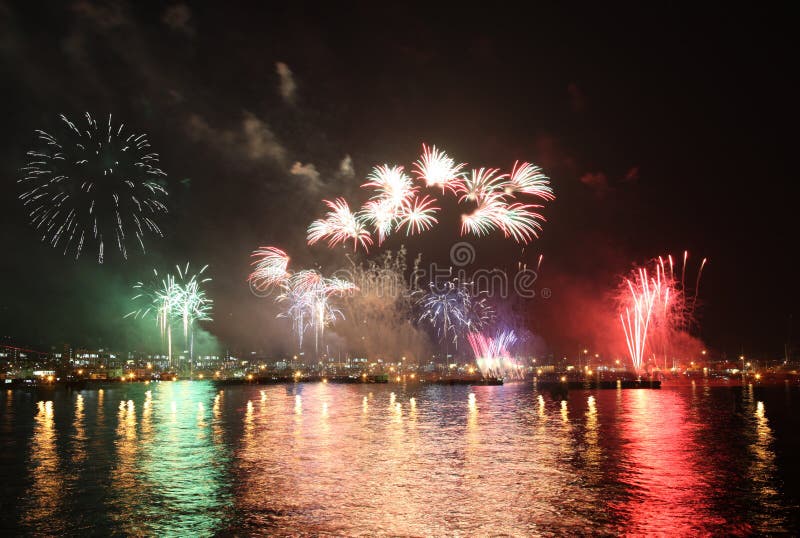 Fireworks Reflect on Sea Water Stock Photo - Image of fire, asia: 32755144