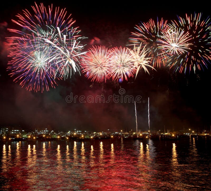 Fireworks Reflect on Sea Water Stock Image - Image of asia, celebration ...