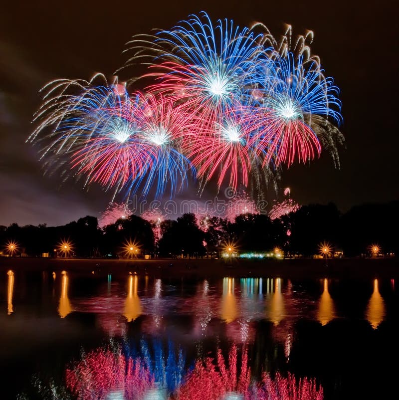 Fireworks Over City by the Water Stock Photo - Image of magic, dark ...