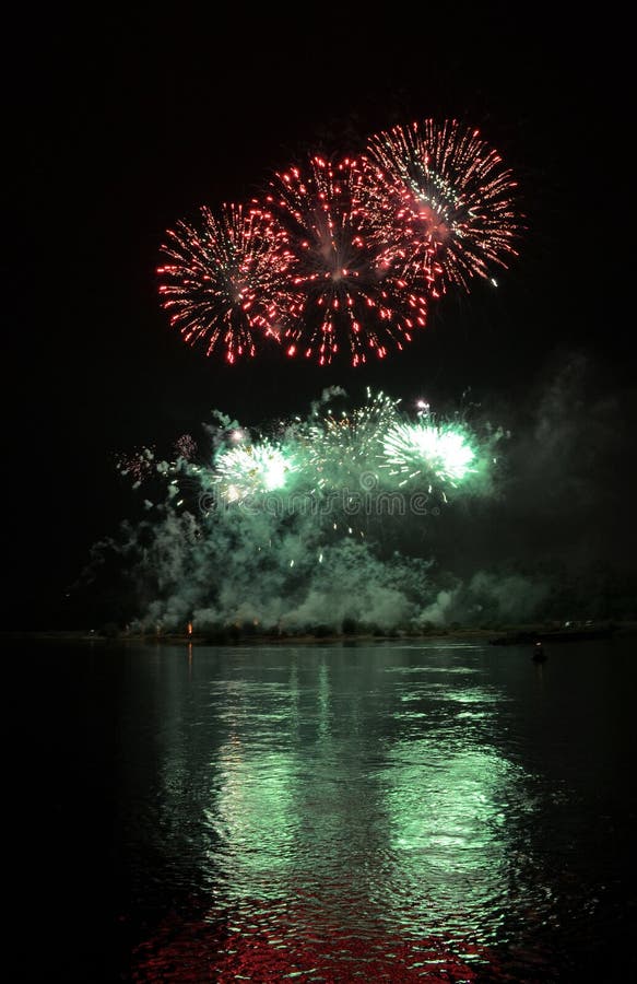Fireworks on river stock image. Image of close, holiday - 136985829