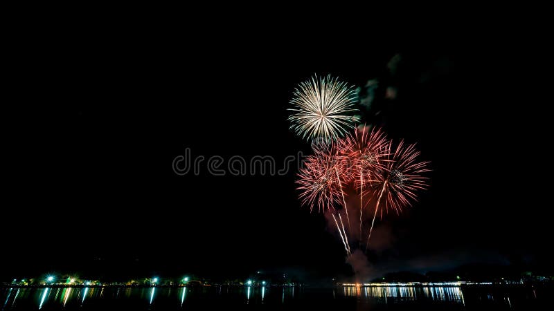 Fireworks at riverside stock photo. Image of party, people - 63759942