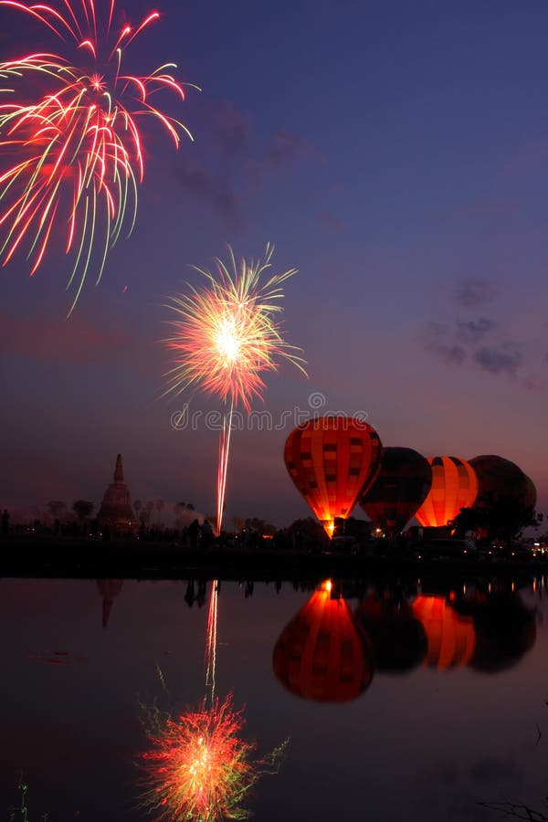 Night Glow Hot Air Balloon with Beautiful Firework Stock Image - Image ...