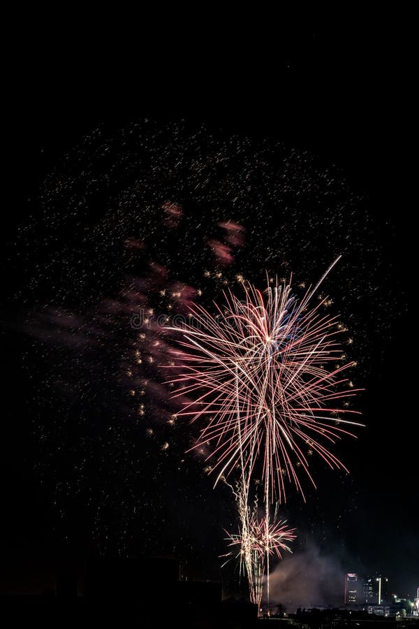 Fireworks Show with Pyrotechnics Launched at Different Heights and Many ...