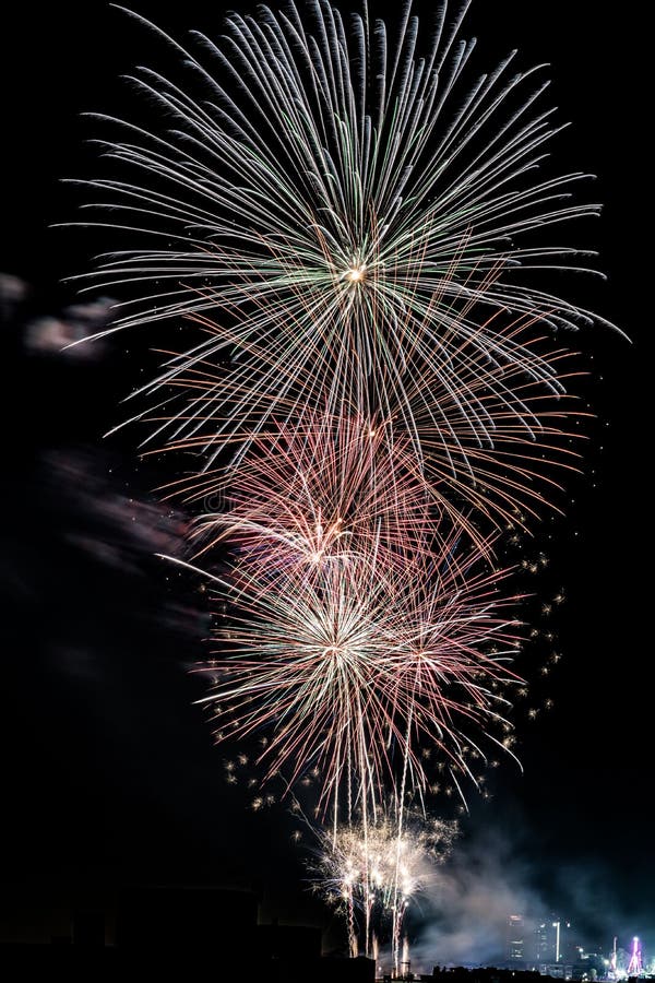 Fireworks Show with Pyrotechnics Launched at Different Heights and Many ...