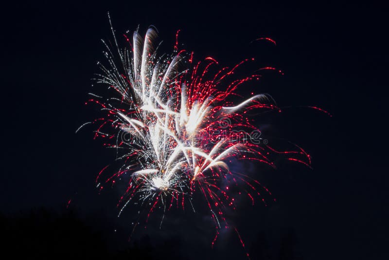 Fireworks Sparking in the Night Sky Stock Photo - Image of fireworks ...