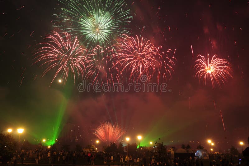 Fireworks and spectators stock photo. Image of festive - 80762252