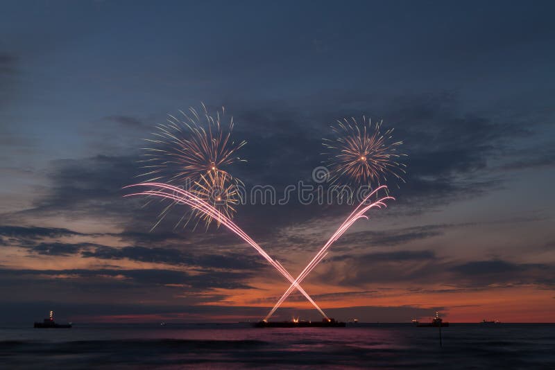Fireworks at sunset stock photo. Image of pyrotechnic - 26391826