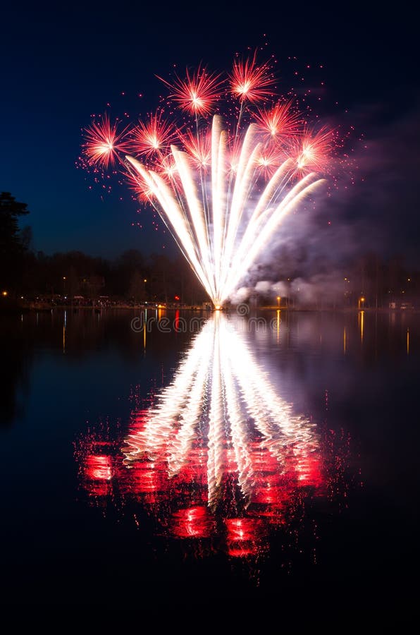 Fireworks at the lake stock image. Image of celebrate - 146150655