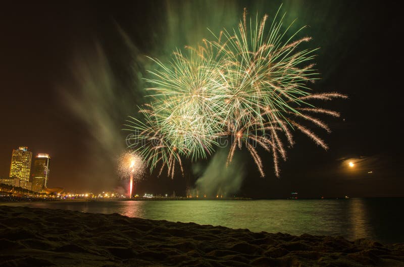 Fireworks on the Water Seen from the Beach, in Barcelona Stock Photo ...