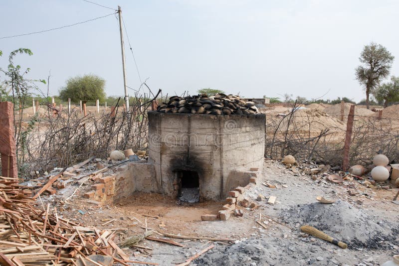 Firing of pottery stock image. Image of iron, ceramic - 244713521