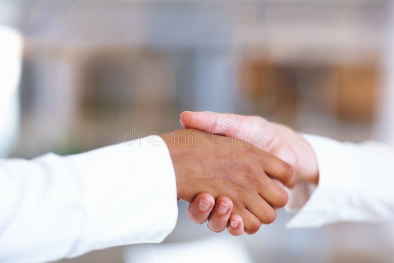 Firm Handshake. Closeup of Multiracial Handshake between Two Business ...