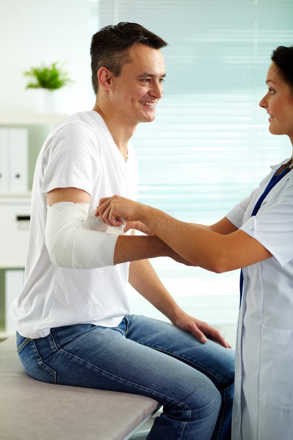 Giving first aid stock image. Image of caucasian, clinician - 25939601