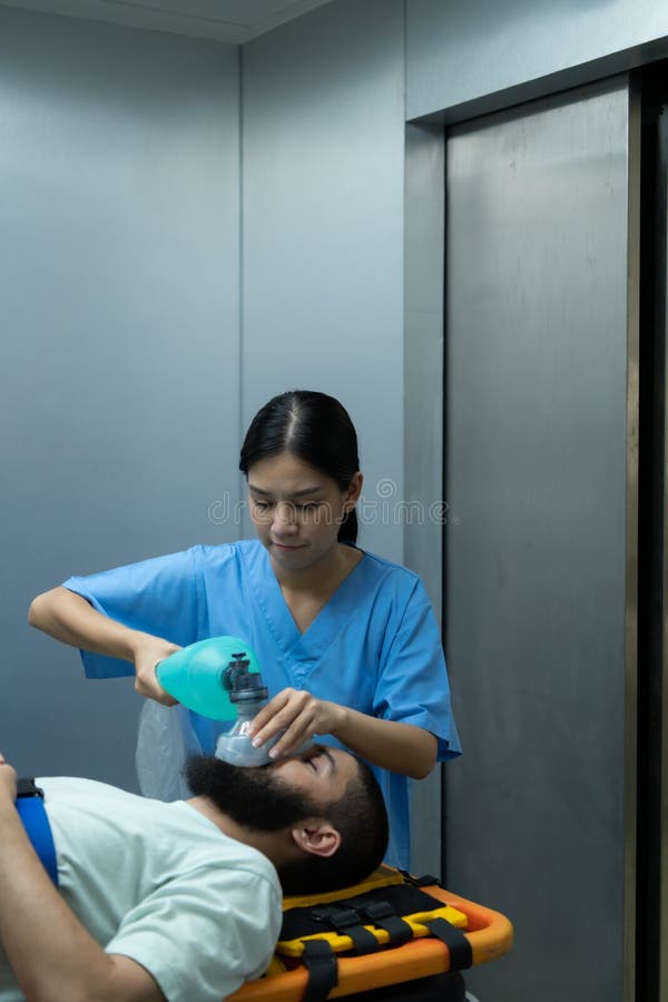 First Aid Assistance with Hand-squeezed Breathing Stock Image - Image ...