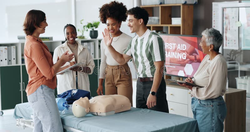 First Aid, Happy and People High Five for Success, Presentation or ...