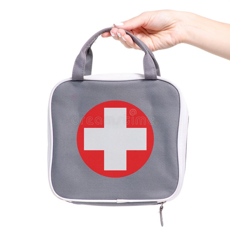 First-aid kit bag in hand stock image. Image of accident - 127107223