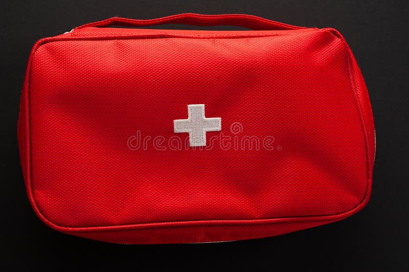 First Aid Kit on a Black Background Close Up Stock Photo - Image of ...