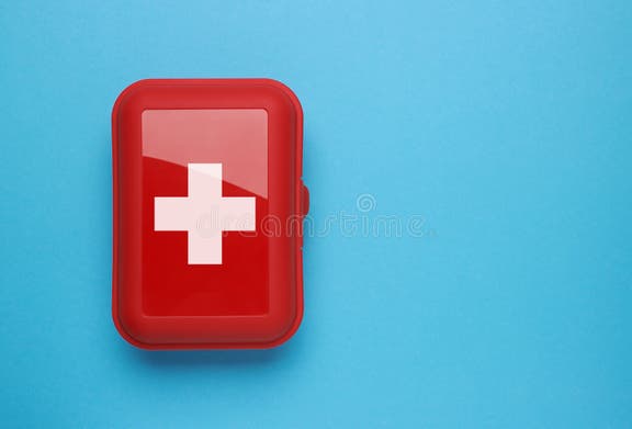 First Aid Kit on blue stock photo. Image of relief, icon - 362016840
