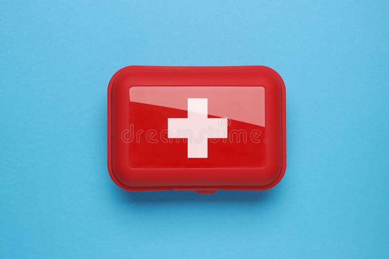 First Aid Kit on blue stock photo. Image of medicine - 364997858