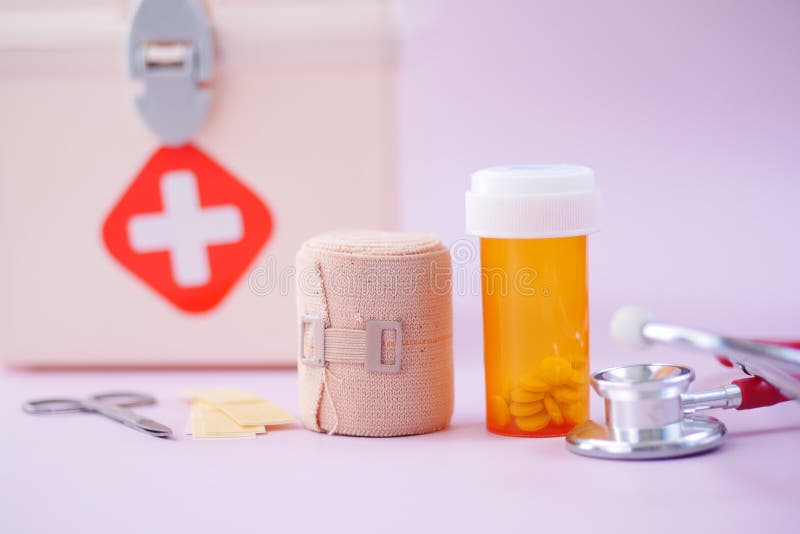 First Aid Kit Box and Medical Pill on Table Stock Photo - Image of ...