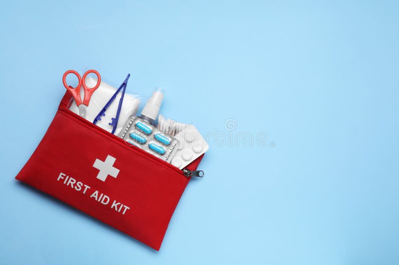 First Aid Kit on Light Blue Background, Top View. Space for Text Stock ...